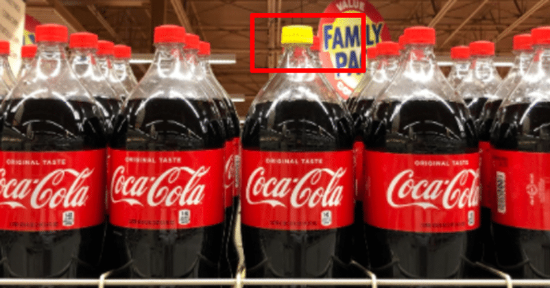 Here's Why Some Coca Cola Bottles Have A Yellow Cap — Marketing Mind